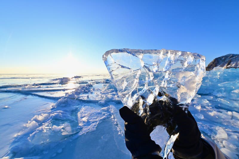 Hand Holding Triangular Ice Formation at Lake Baikal during Winter ...
