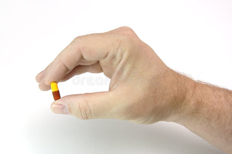 Hand Holding Two Color Pill Stock Image - Image of vitamins ...