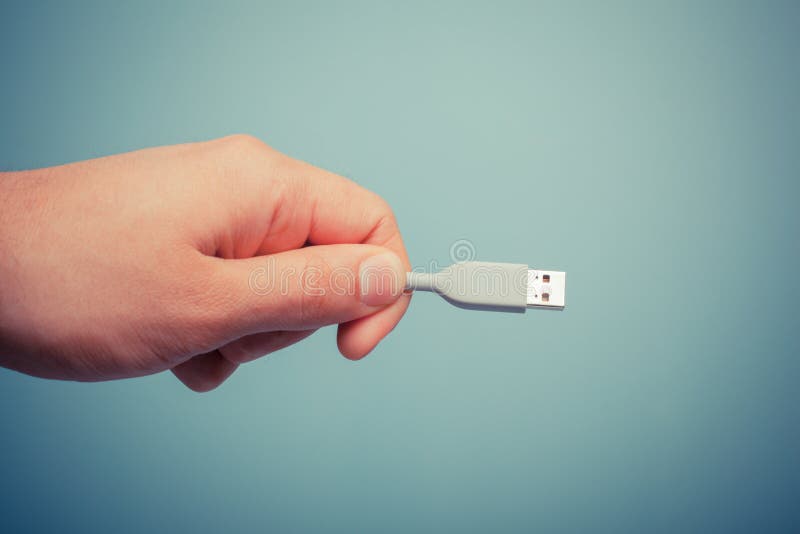 Hand holding usb cable stock image. Image of wire, electric - 40188987