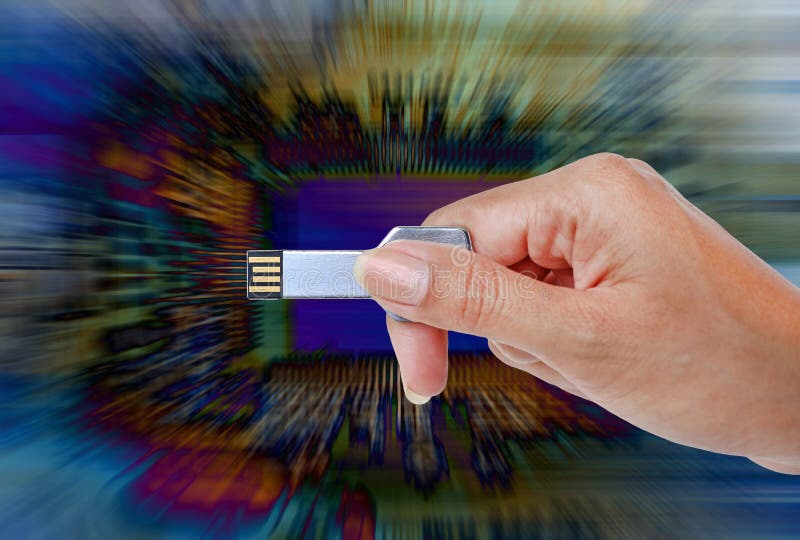 Hand Holding USB Data Storage Against Light and Circuit Stock Photo ...