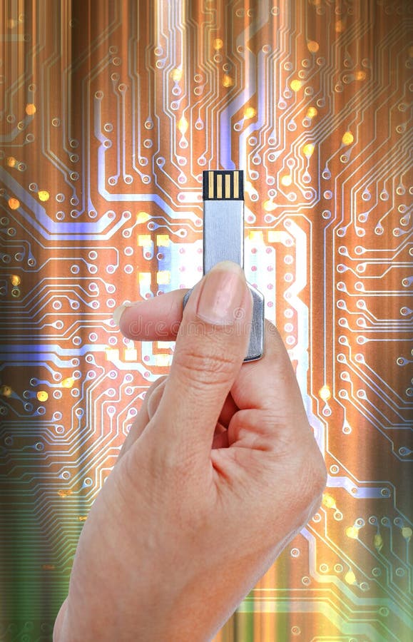 Hand Holding USB Data Storage Against Light and Circuit Stock Image ...