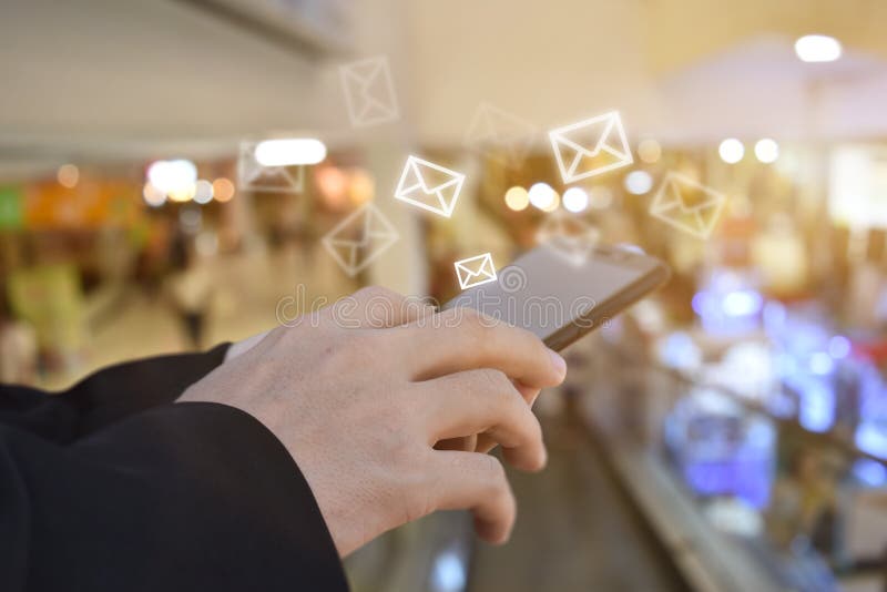 Hand Holding Using Mobile Phone with Email Icon on Screen Stock Image ...