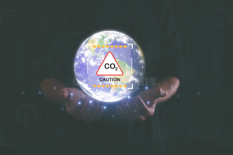 Hand Holding Virtual Glob and Caution Sign CO2 Reduce Icon Concept of ...