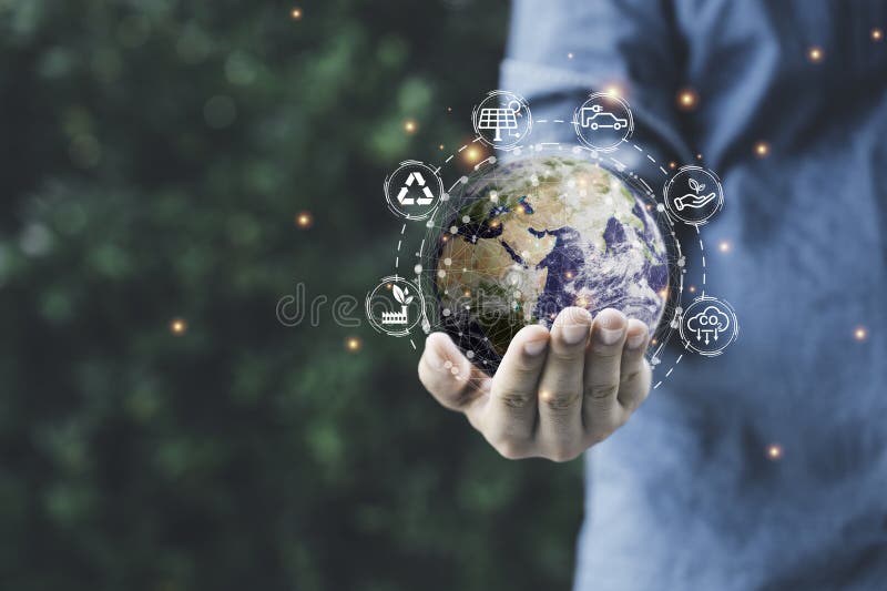 Hand Holding Virtual World with CO2 Reducing ,Recycle ,green Factory Icon on Nature for Decrease ...