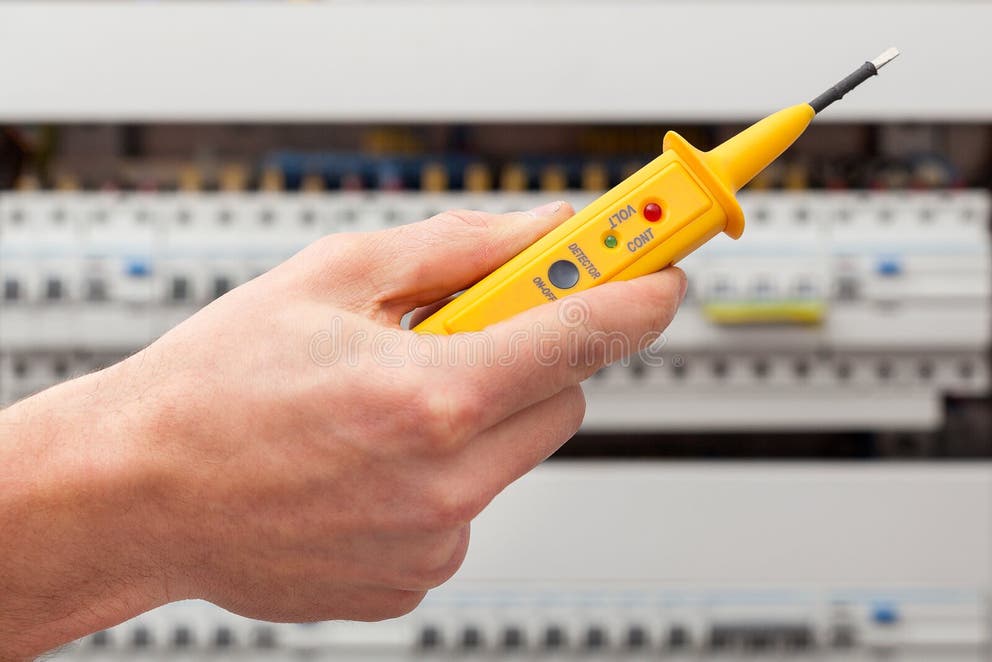 Hand holding voltmeter stock photo. Image of control - 38416980