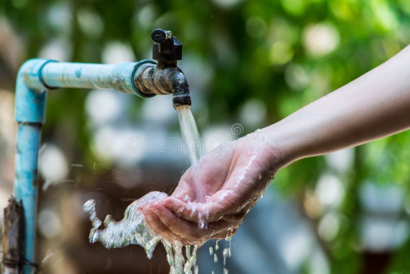Hand Holding the Water Flow Stock Image - Image of drinking, drink ...