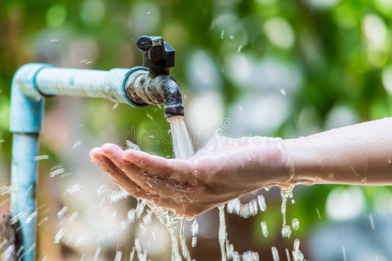 Hand Holding the Water Flow Stock Photo - Image of flowing, body: 249282004