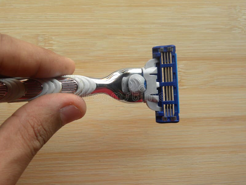 Hand Holding Disposable Razors Stock Photos - Free & Royalty-Free Stock ...