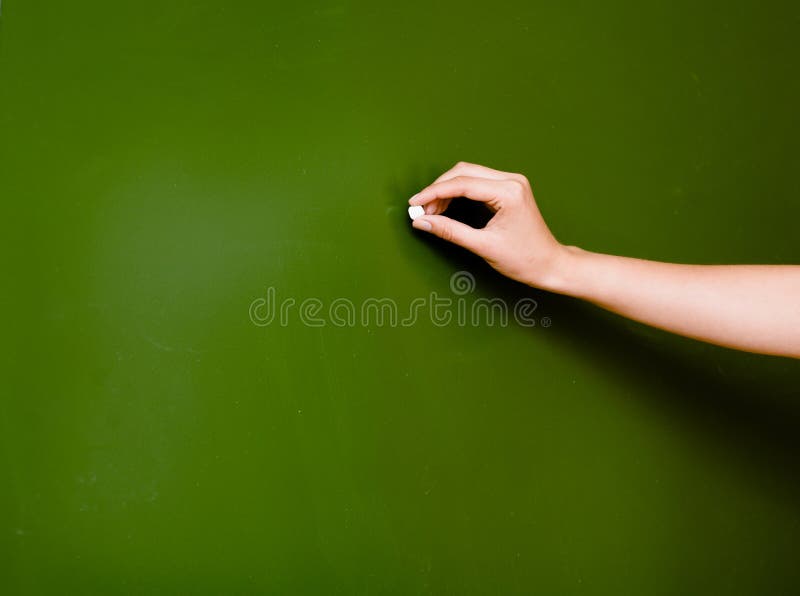 Hand Holding a White Chalk about To Write Stock Image - Image of ...