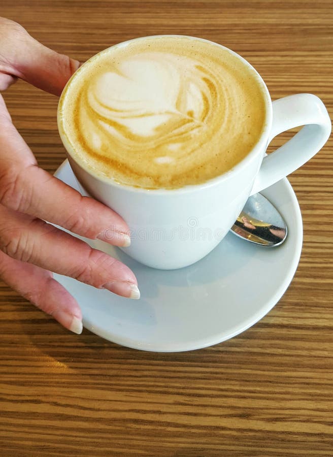 Hand Holding White Coffee Mug Stock Photo - Image of breakfast ...