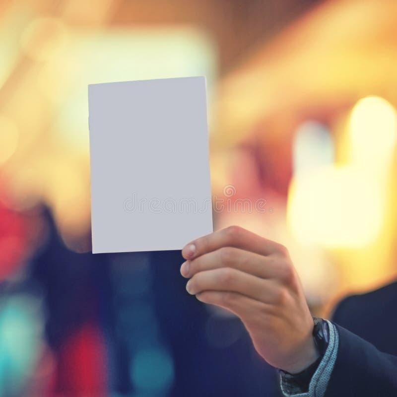 Hand holding white paper stock image. Image of paper - 62764319