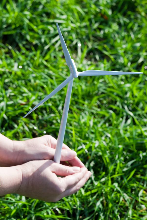 Hand holding wind turbine stock image. Image of miniature - 28098465