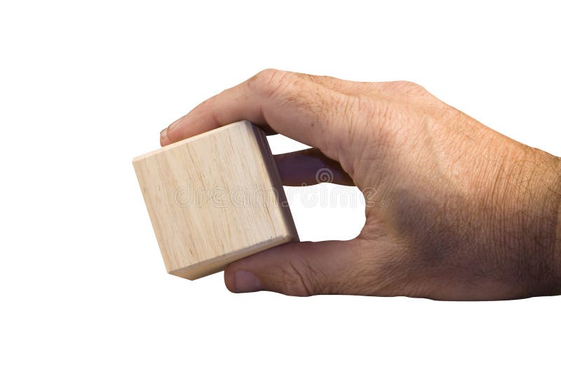 Hand holding wooden block stock image. Image of hand, person - 3647561