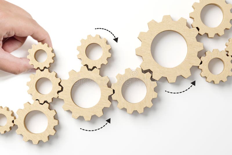 Hand Holding Wooden Cog Flowing Process Management on White Background ...