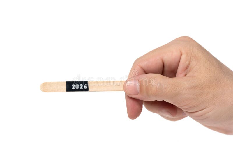 Hand Holding Wooden Stick with Inscription 2026 Stock Image - Image of ...