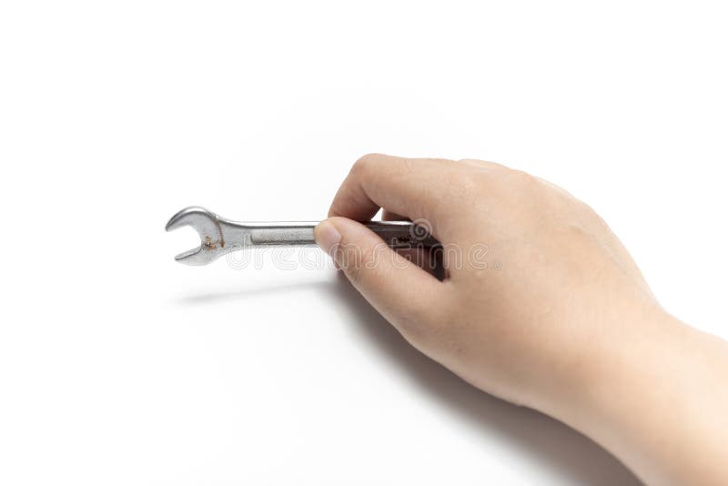 Hand holding wrench stock photo. Image of machine, spanner - 53228746