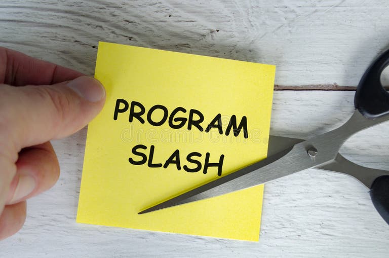 Hand Holding a Yellow Sticky Note with the Words Program Slash Written ...