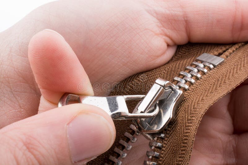 Hand holding zipper stock image. Image of unzip, connection - 67755003