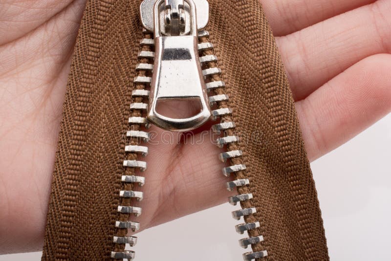 557 Hand Holding Zipper Stock Photos - Free & Royalty-Free Stock Photos ...