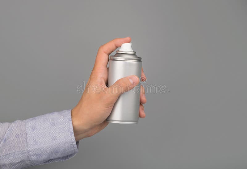 Hand Holds Aerosol Spray Can Stock Photo - Image of holds, freshener ...