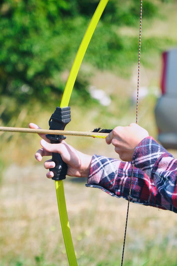 Hand Holds Archery and Arrow Stock Photo - Image of archery, drawing ...
