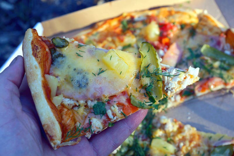 Hand Holds a Big Slice of Pizza Stock Photo - Image of homemade ...