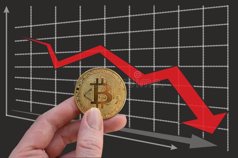 Hand Holds Bitcoin on Background of Falling Graph with Red Arrow ...