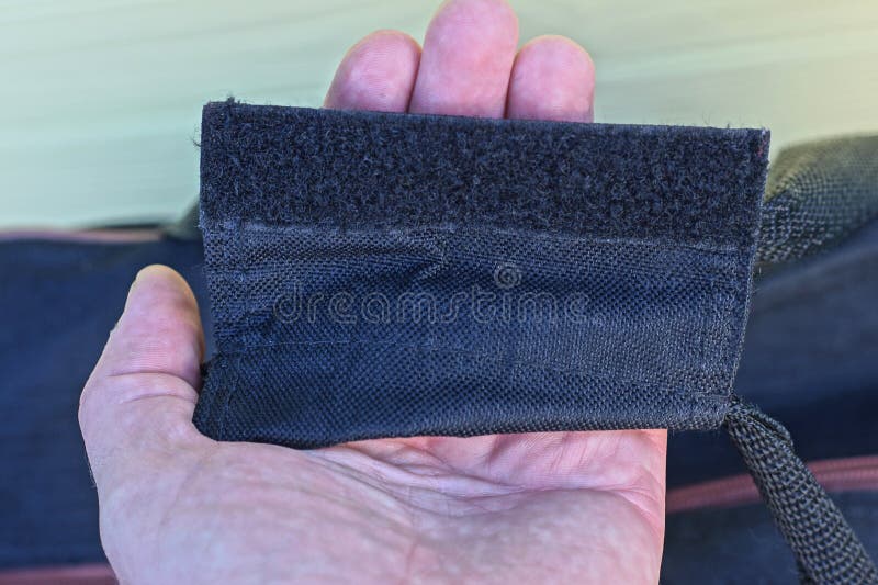 Hand Holds a Black Fabric Handle on the Bag Stock Image - Image of belt ...