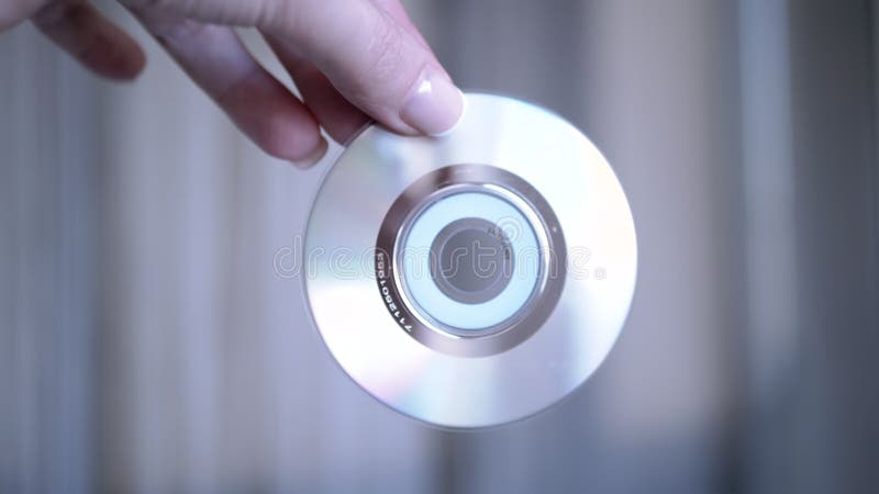 Hand Holding CD Against Light Stock Footage - Video of background ...