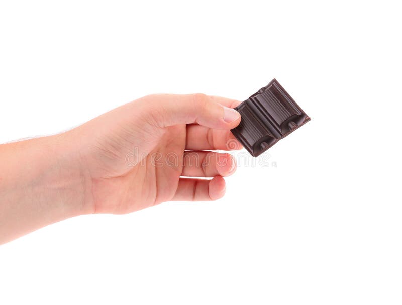 Hand holds chocolate bar. stock photo. Image of black - 34125346