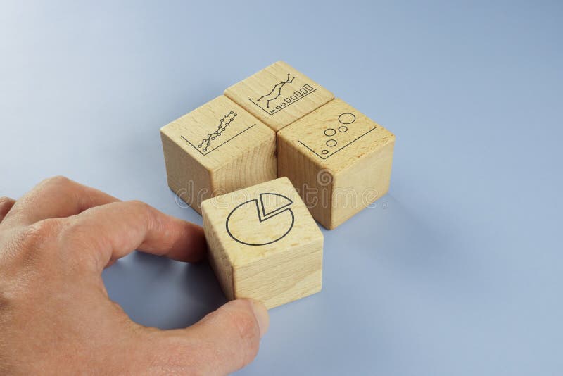 The Hand Holds a Cube with a Graph. Business Analysis and Planning ...