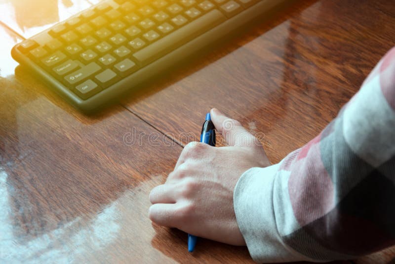 A Hand that Holds the Handle on the Desktop, Keyboard Stock Photo ...
