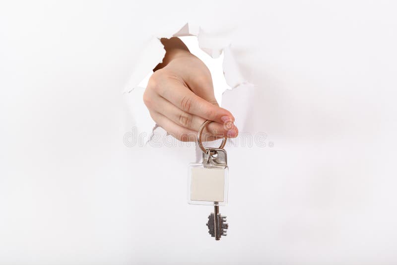 Hand Holds the Keyring through a Hole Stock Photo - Image of gesture ...