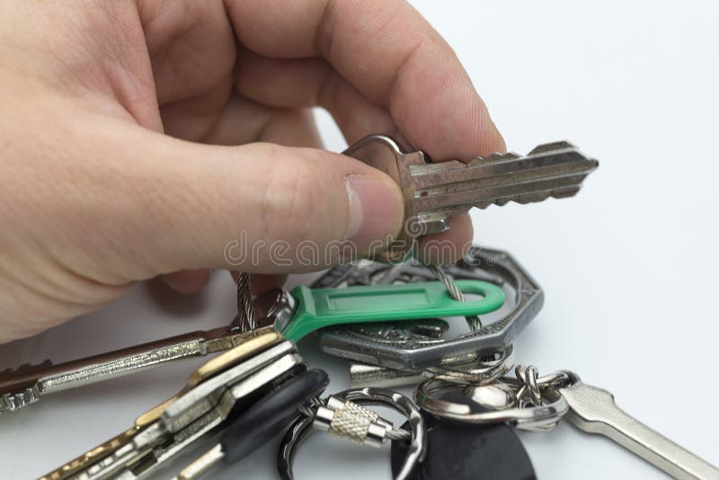 Closeup On Man Hand Holding Keys To Apartment Door. Stock Photo - Image ...