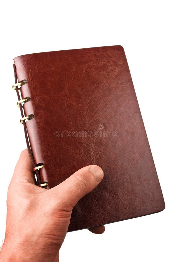 Hand Holds a Leather Notebook Stock Image - Image of person, holds ...