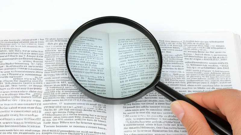 Hand Holds Magnifying Glass Over Book Detail Stock Photos - Free ...