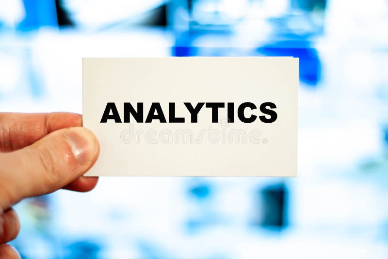 Hand Holds Paper with the Word - ANALYTICS on a Blue Background Stock ...