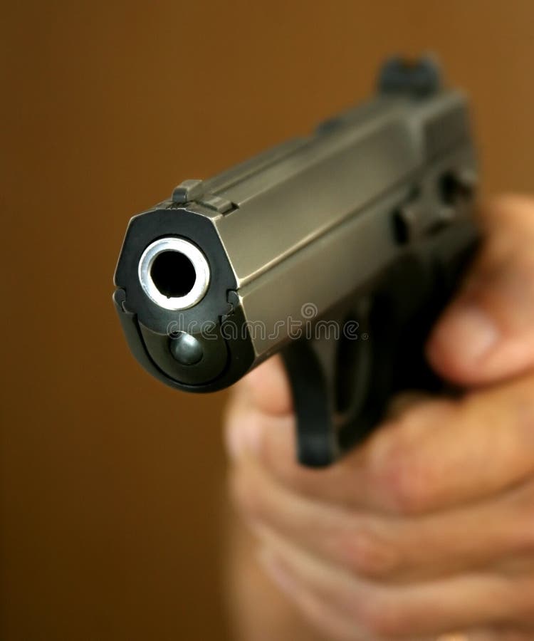 Pistol in hand stock photo. Image of pistol, hunter, hand - 3570384