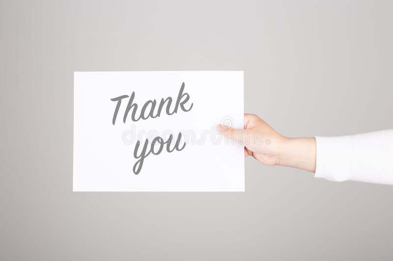 Hand Holds a Sign with the Message Thank You Stock Photo - Image of ...