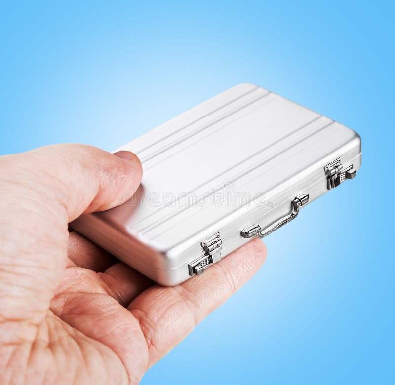 Hand Holds a Small Aluminum Case Stock Photo - Image of occupation ...