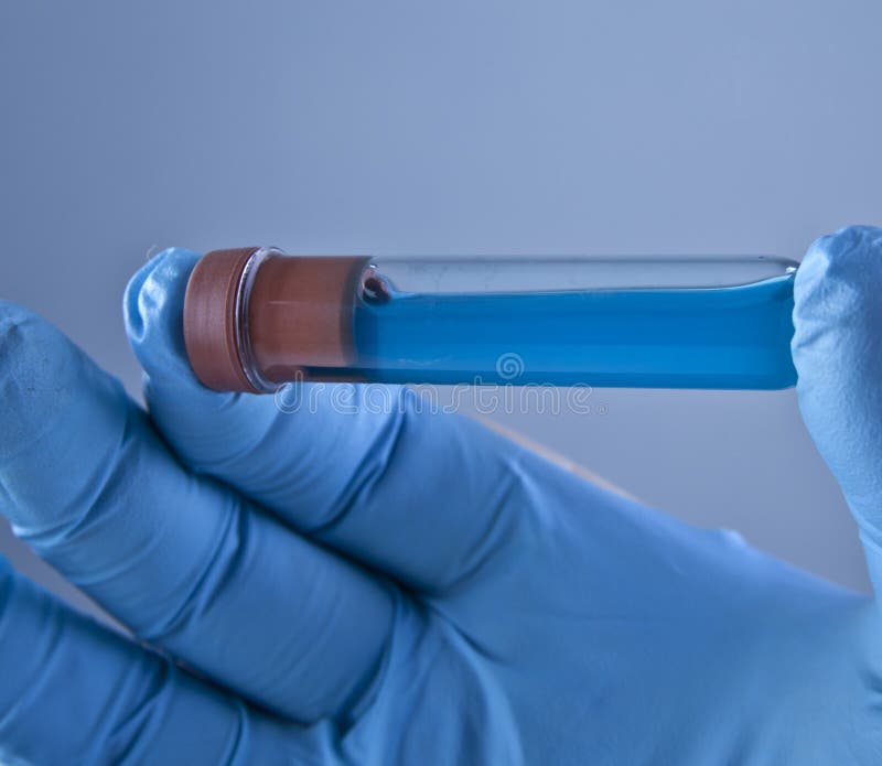 Hand holds test tube stock photo. Image of gown, epidemy - 27479696