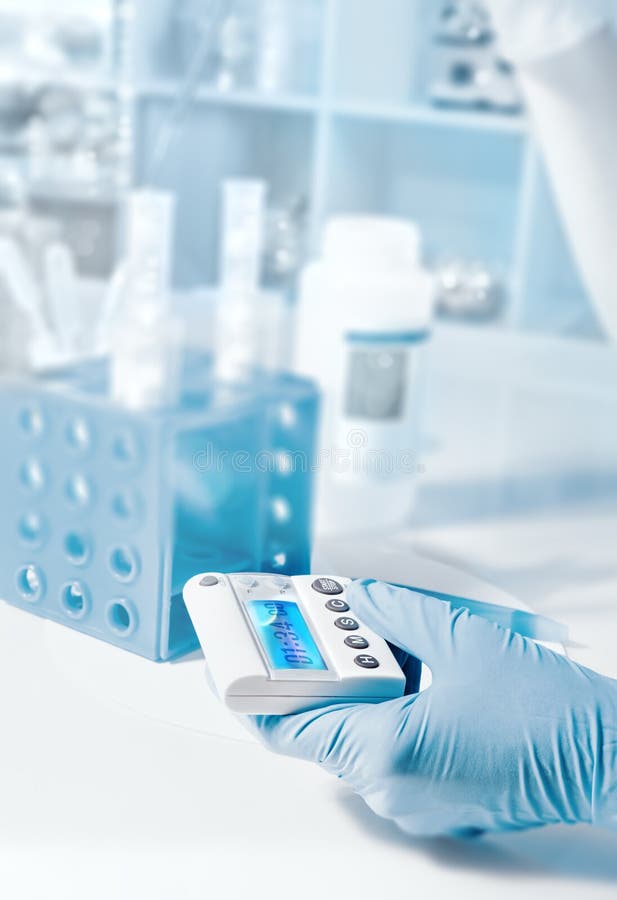 Hand Holds a Timer, Scientific Background Stock Photo - Image of body ...