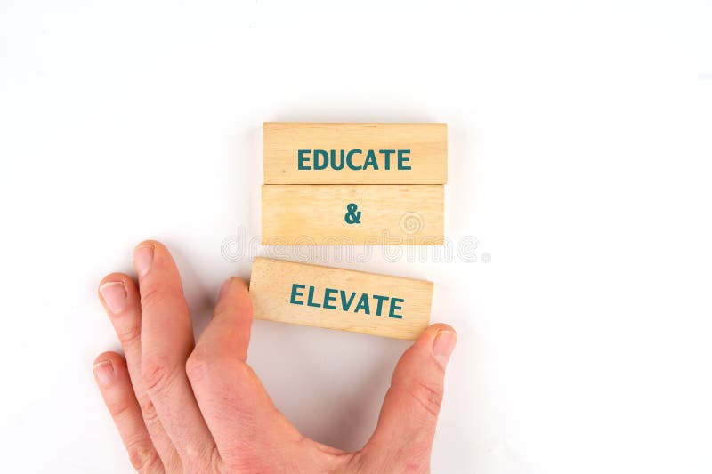 A Hand Holds Two Wooden Blocks Displaying the Words Educate and Elevate ...