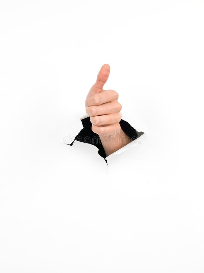 Thumb Up through a Hole in a Paper Stock Image - Image of agreement ...