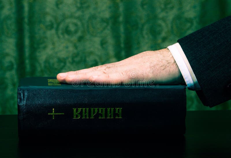 Hand on the Holy Book - Bible Stock Photo - Image of hand, religion ...