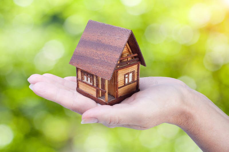 Model House with a Hand stock image. Image of back, house - 10152457