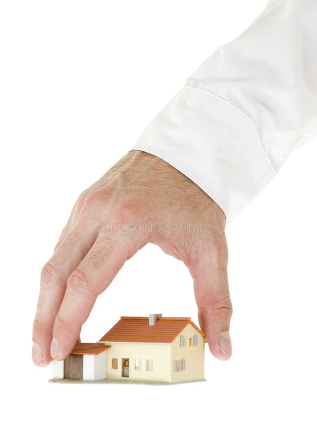 Hand with house stock image. Image of property, white - 6075167