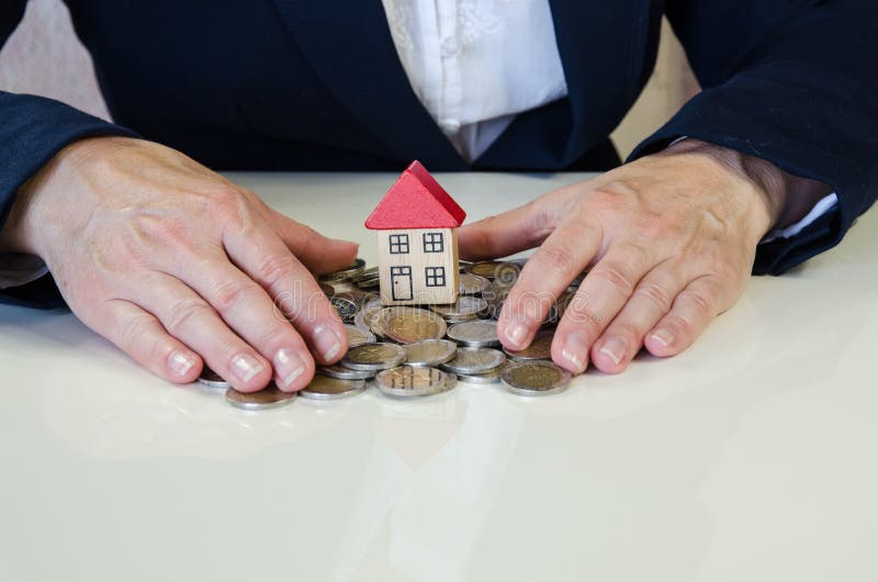 Hand, house and coins stock image. Image of coin, protect - 56911047