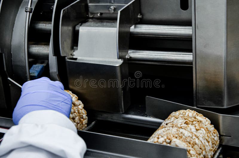 Hand of a Human in Glove Works on Conveyor. Automatic Line for the ...
