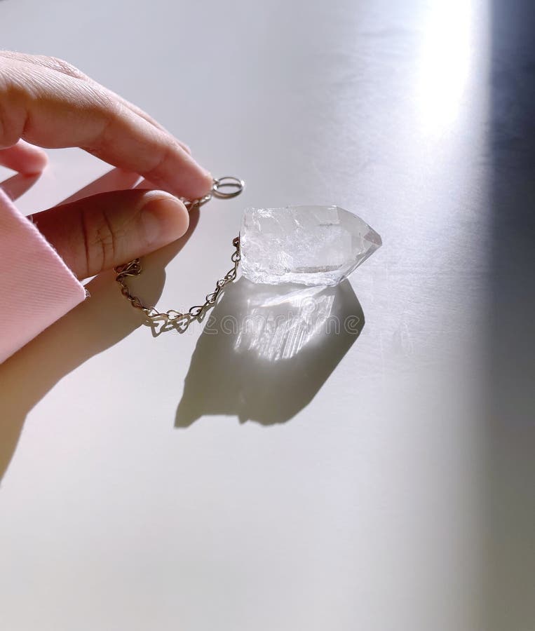 Healer, Magician Holds a Chain with a Crystal Stock Image - Image of ...